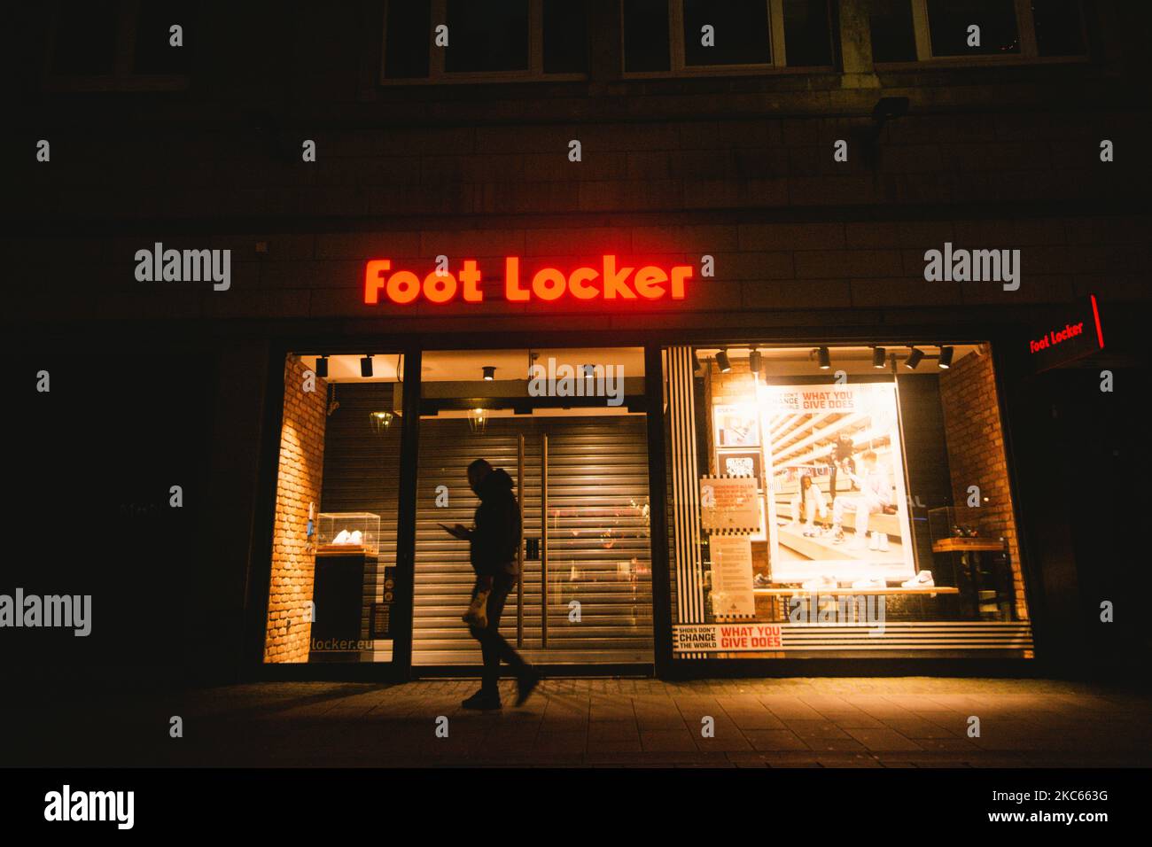 Man walks pass foot hi-res stock photography and images - Alamy