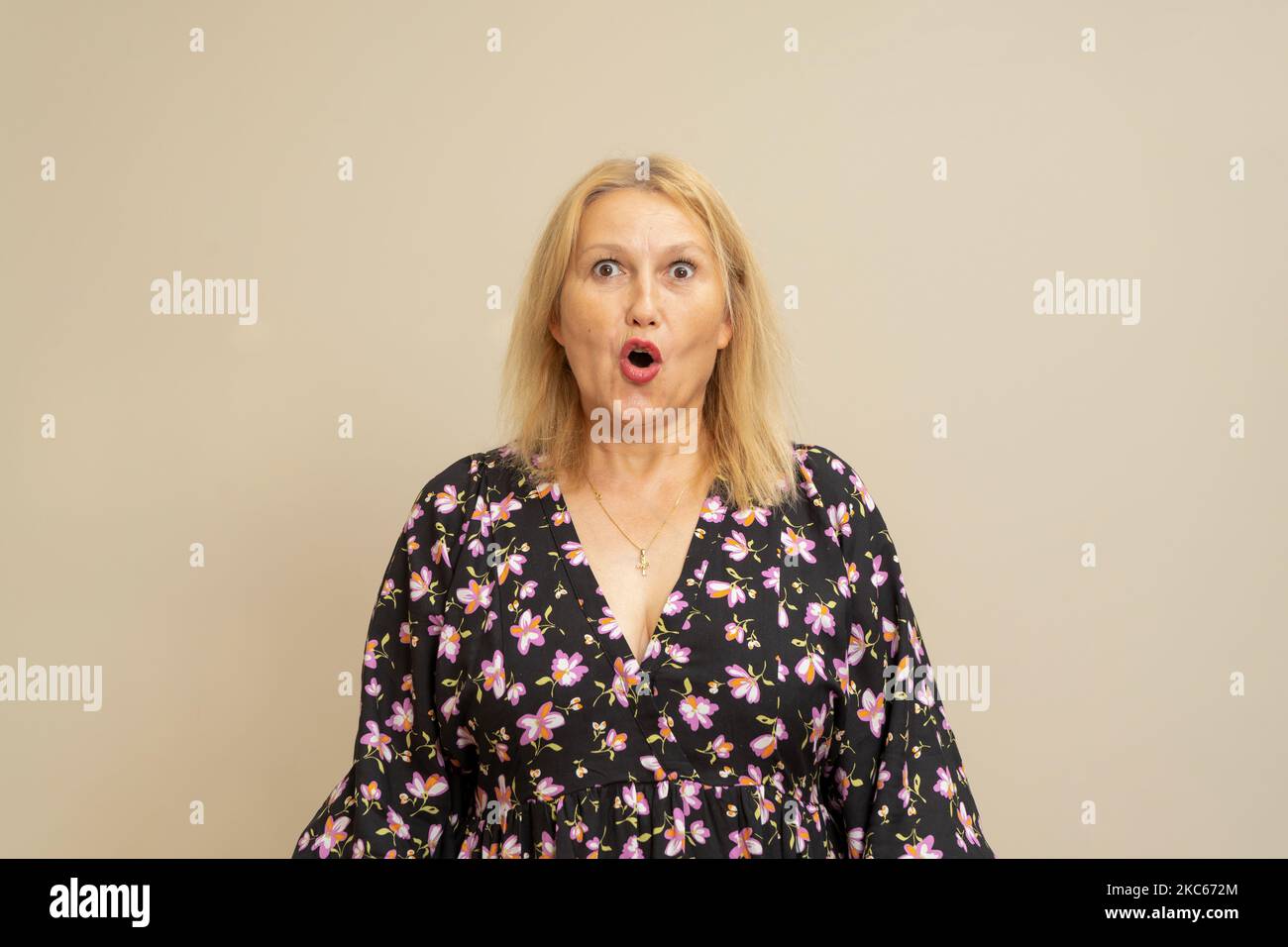 Portrait of shocked and impressed woman with unexpected unbelievable ...