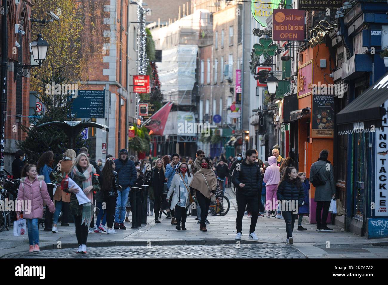 A crowded main street in Dublin's Temple Bar. On Sunday, December 20 ...