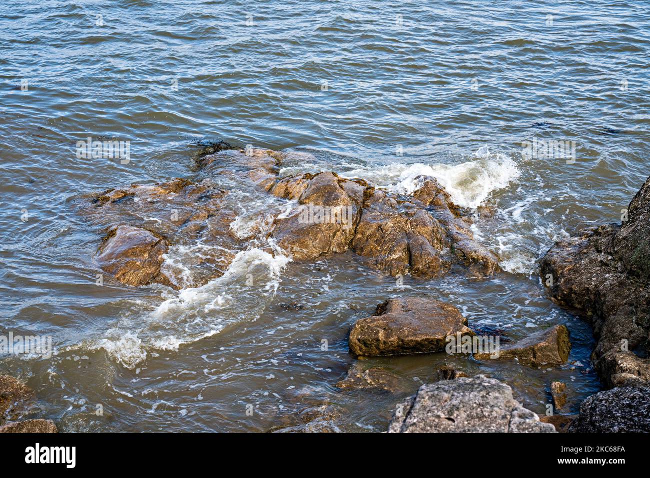 Powerful waves crash over rocks hi-res stock photography and images - Alamy