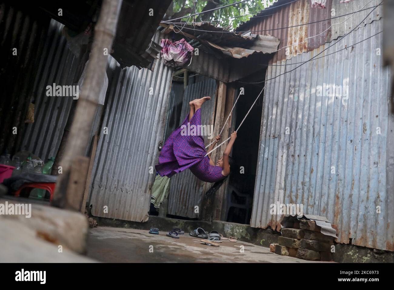 Children are living in a unhealthy environment in Korail slum at Dhaka ...