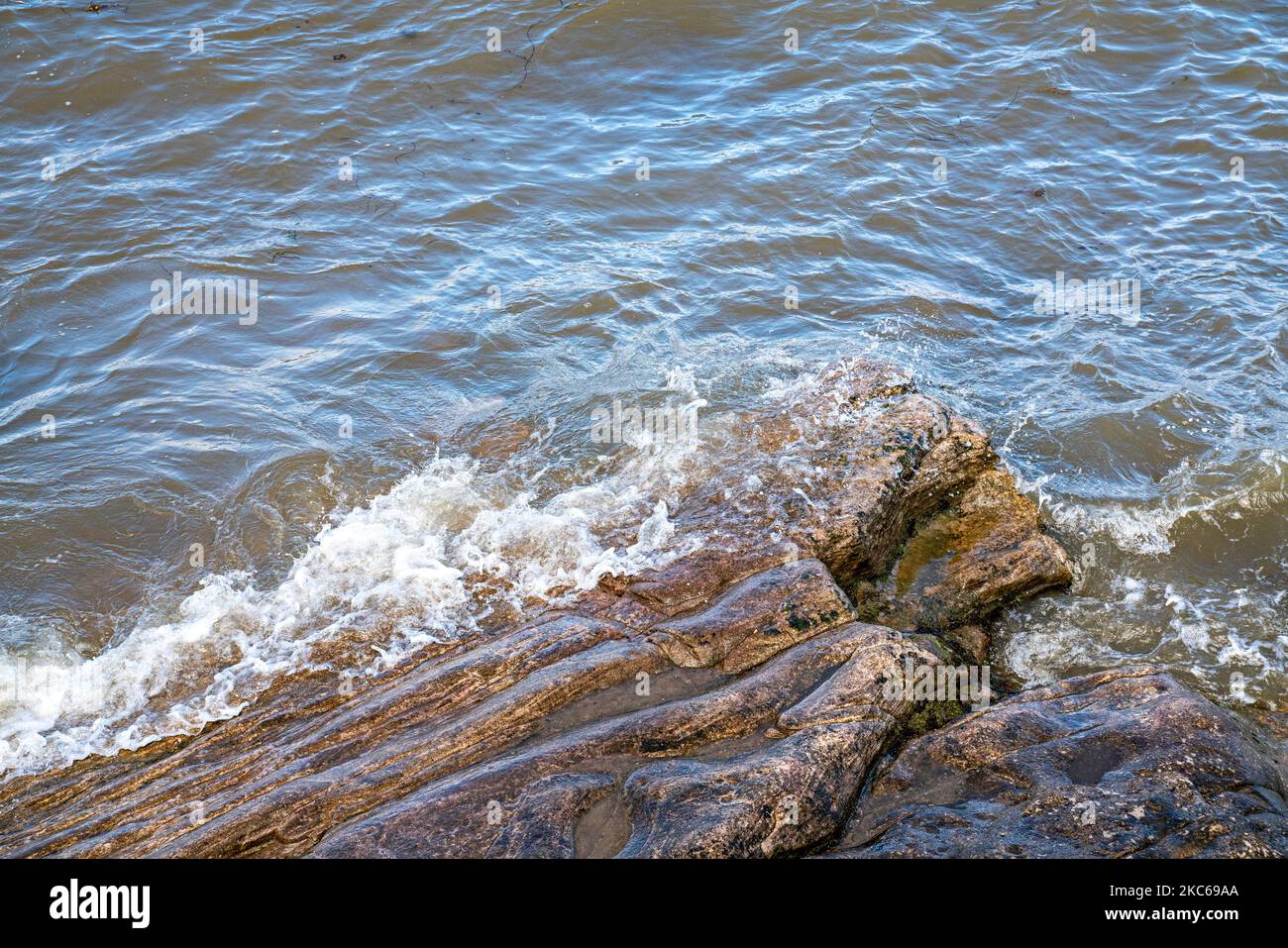 Powerful waves crash over rocks hi-res stock photography and images - Alamy