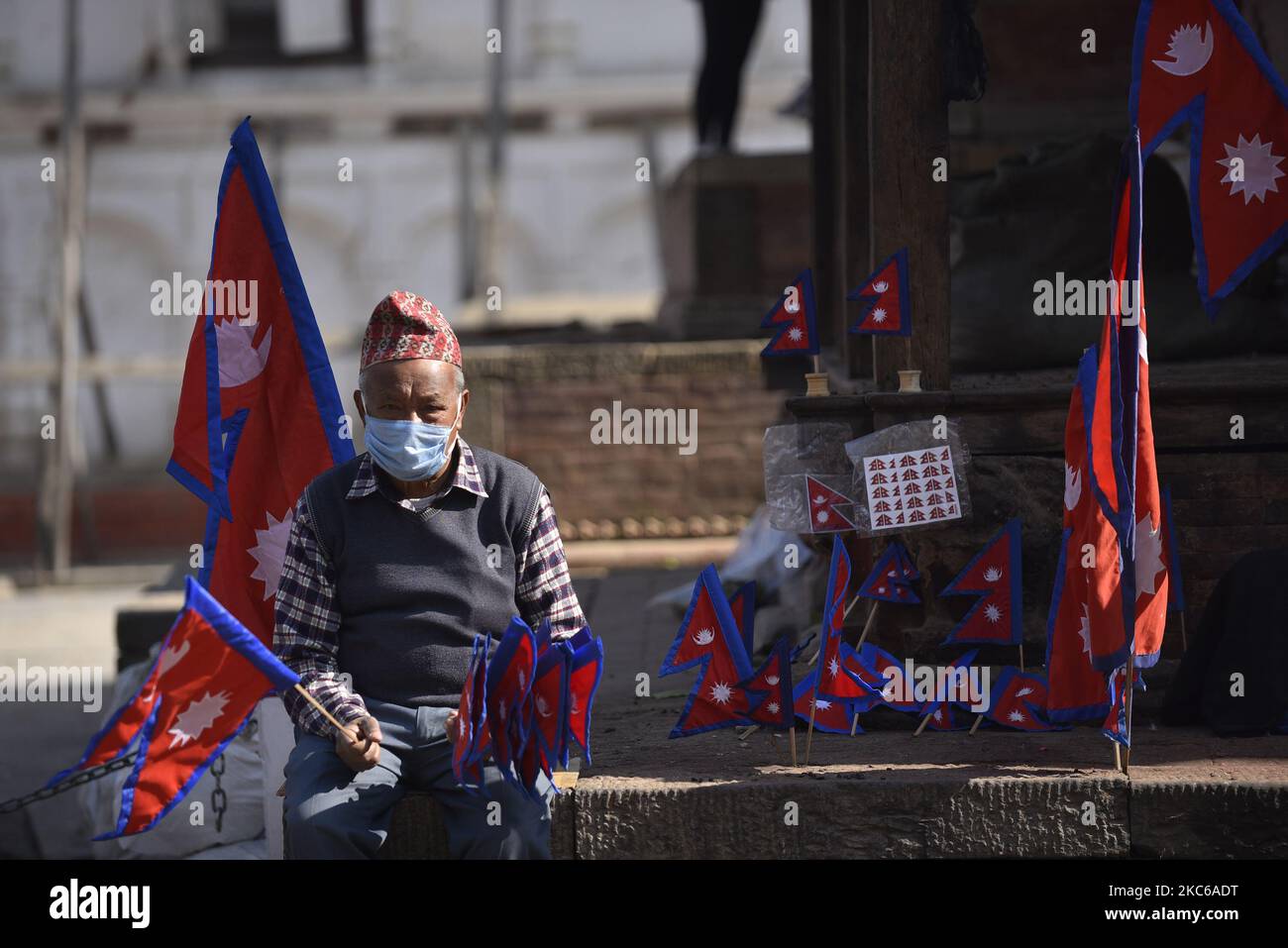 77yrs old, PREM LAL SHRESTHA along with face mask awaiting for the ...
