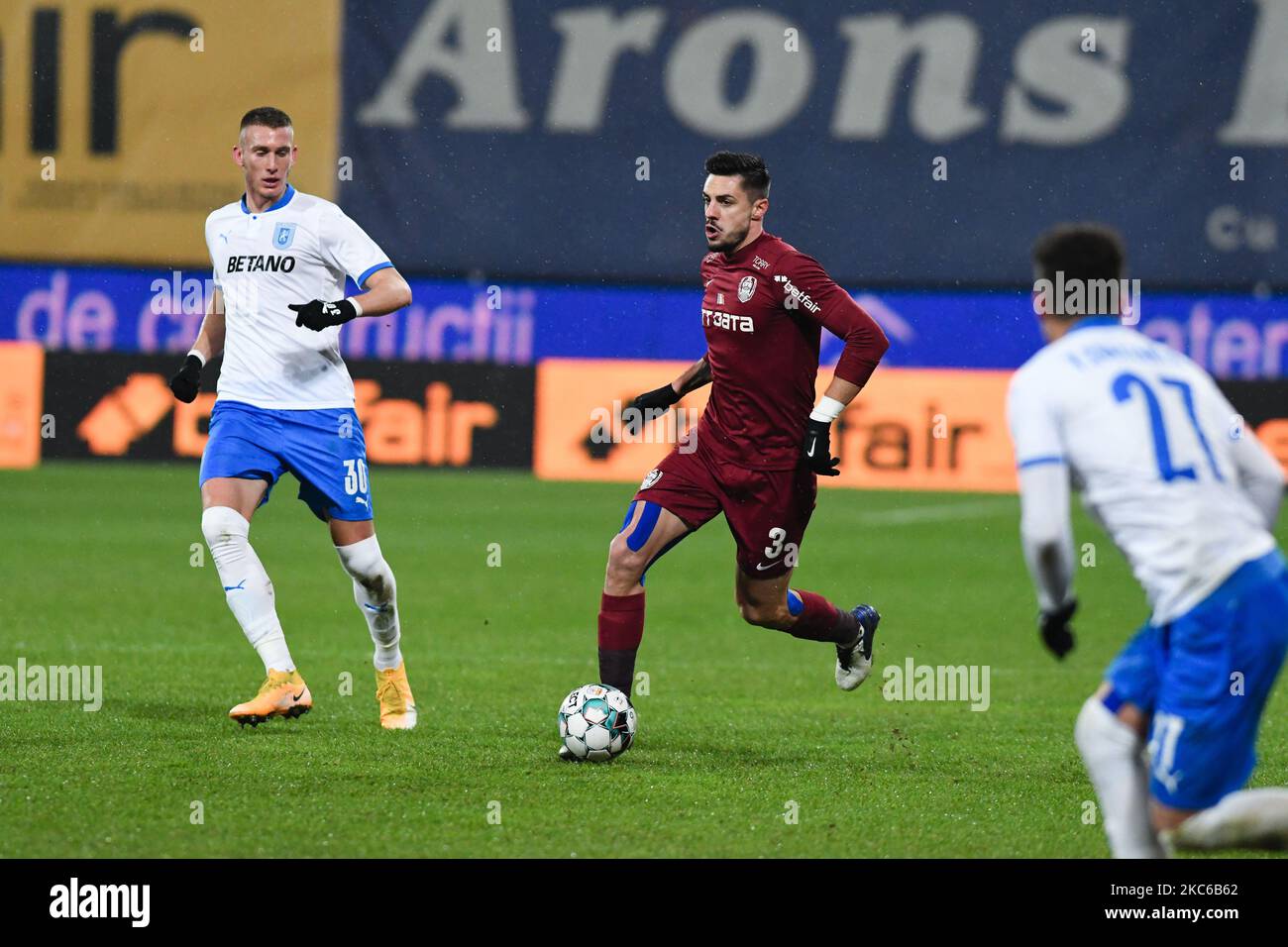Andrei Burca (red), player of CFR 1907 Cluj during CFR 1907 Cluj v ...