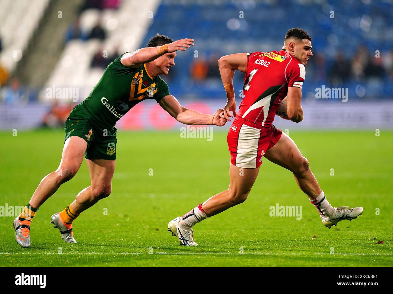 Lebanon's Jacob Kiraz attempts to evade being tackled by Australia's ...