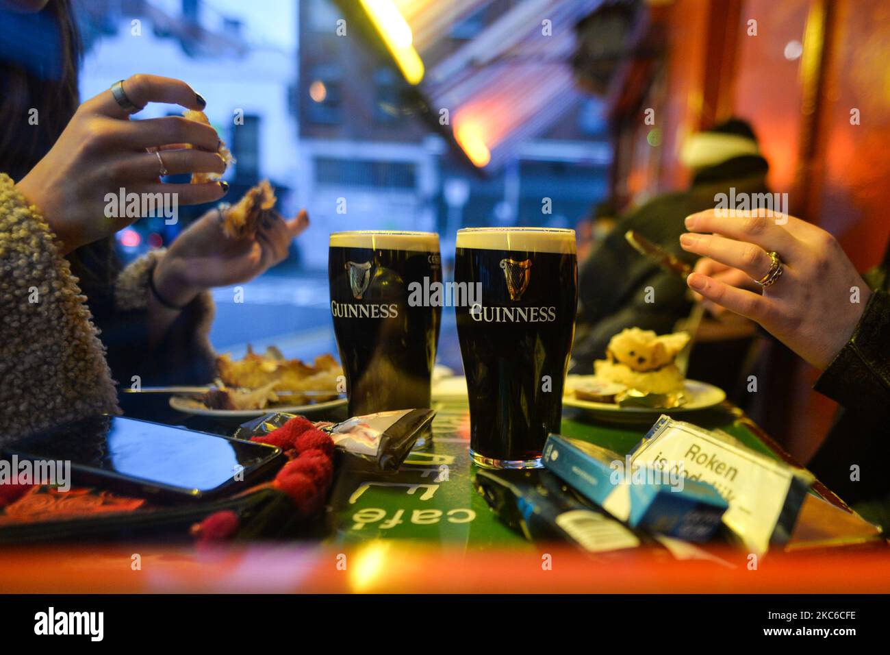 Guinness time opening time hi-res stock photography and images - Alamy