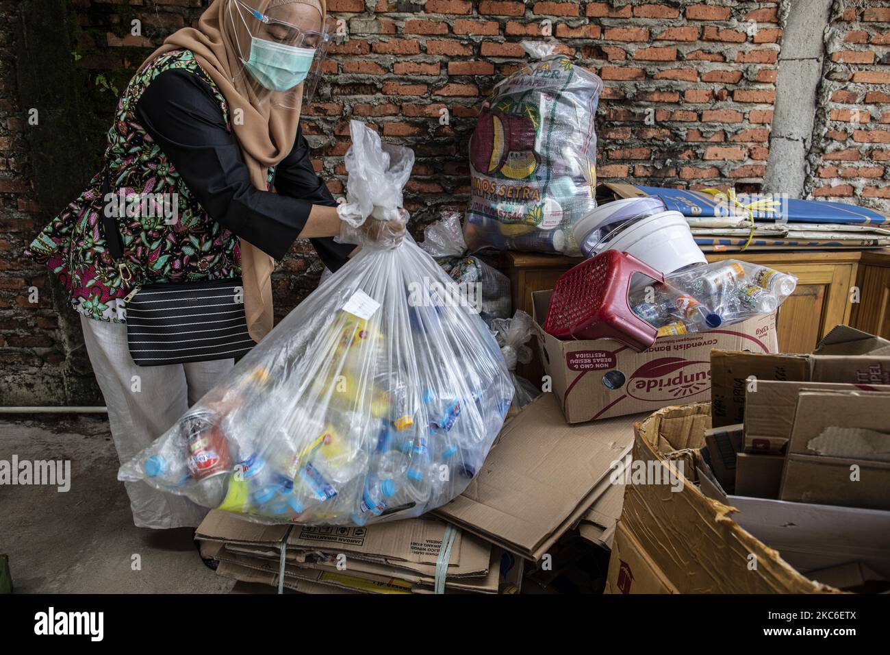 People collect garbages at Garbage Bank Collection in Pamulang, South ...