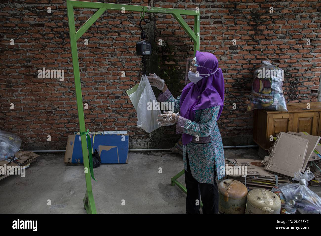 People collect garbages at Garbage Bank Collection in Pamulang, South ...