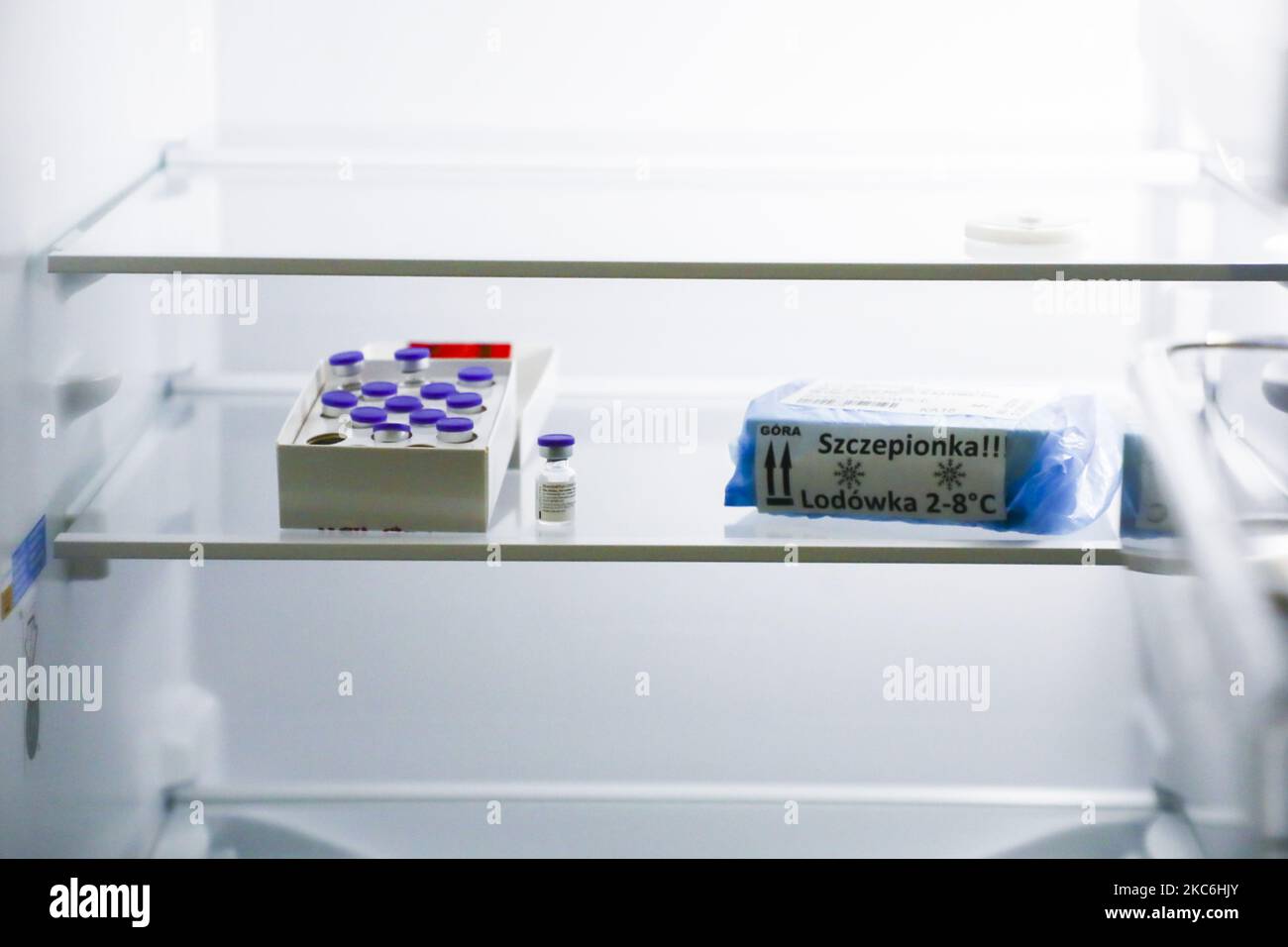 A set of Pfizer BioNTech vaccines is seen inside a refrigerator at the ...