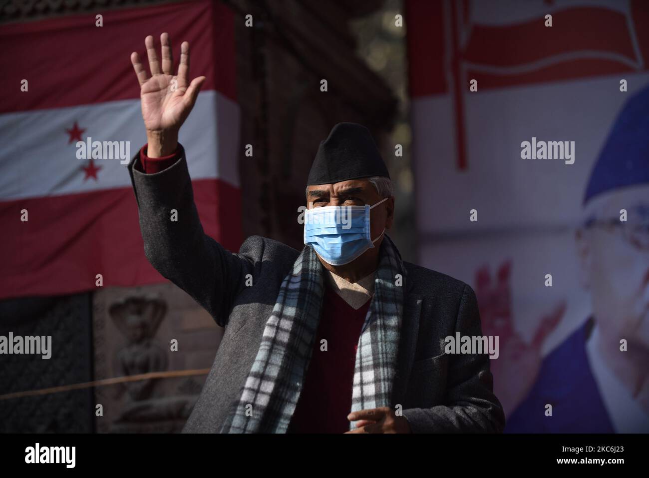 A gesture of Nepali Congress party president Sher Bahadur Deuba as ...