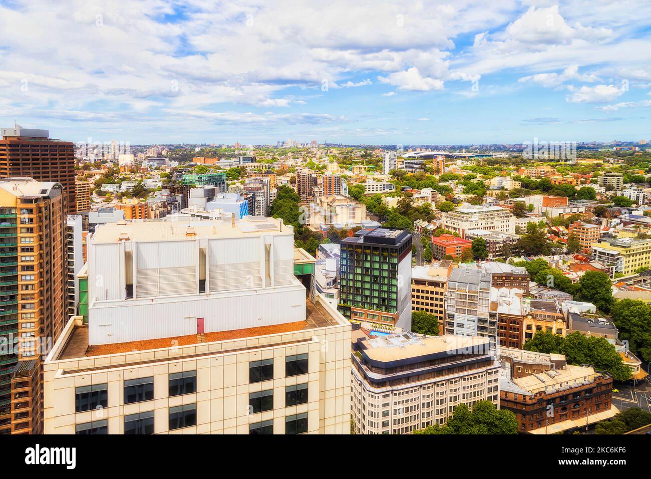 Mid-air cityscape view over roof tops of downtown high-rise towers and ...