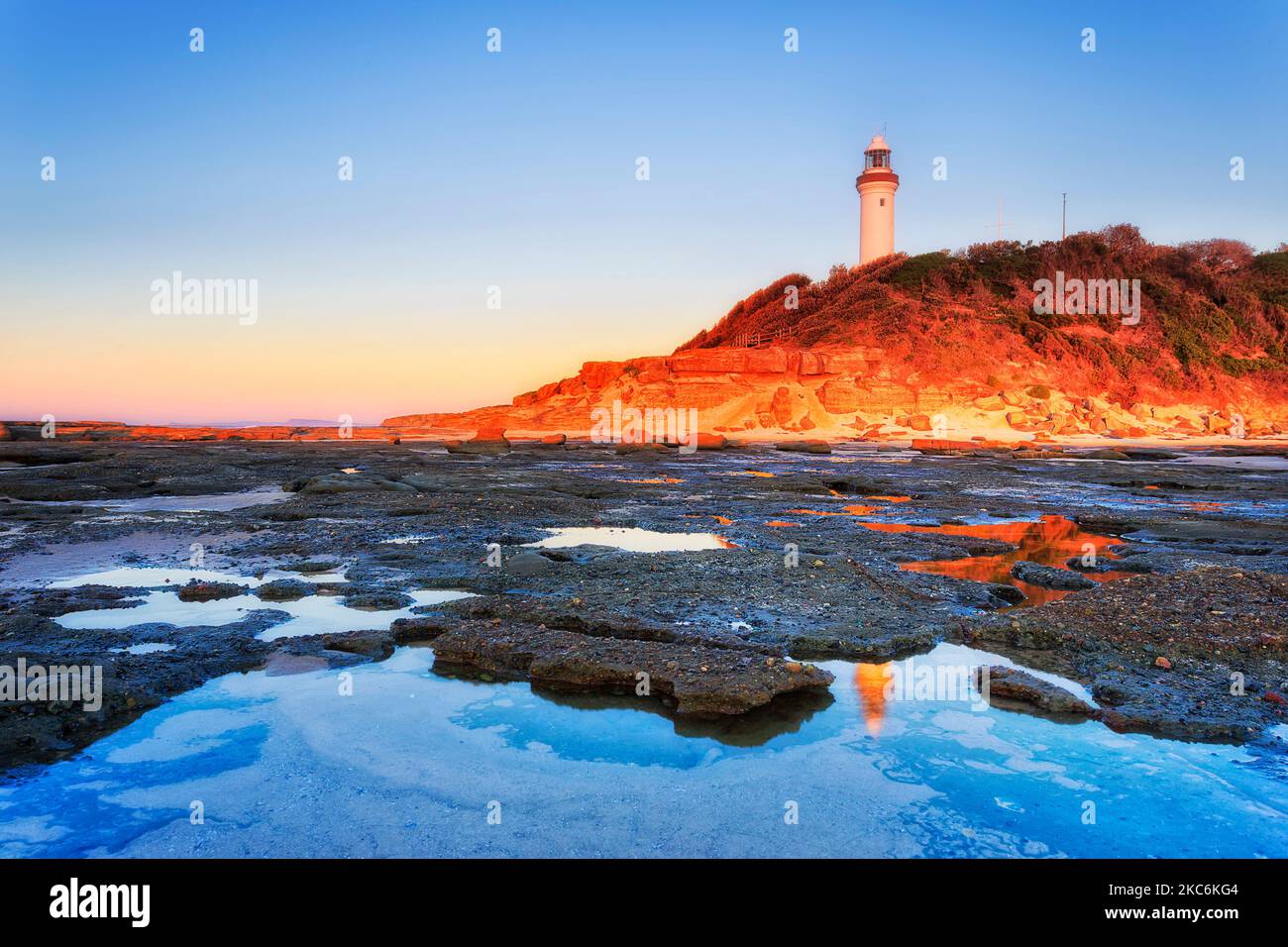 Norah head lighthouse on Pacific coast of Australia at sunrise - scenic ...