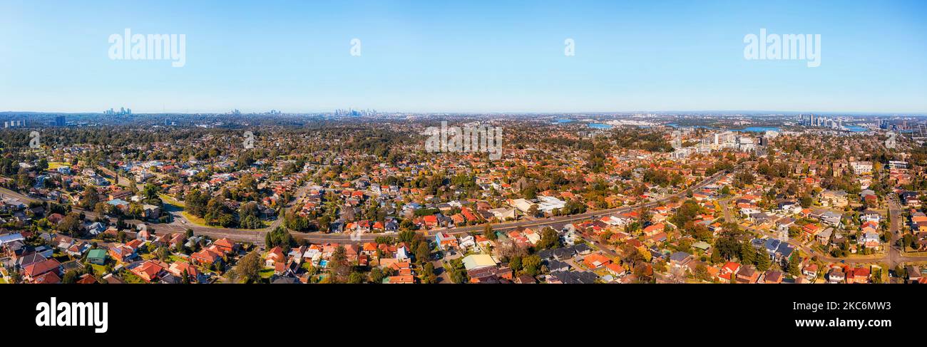 Wide aerial panorama of Western Sydney from City of Ryde to distant CBD ...