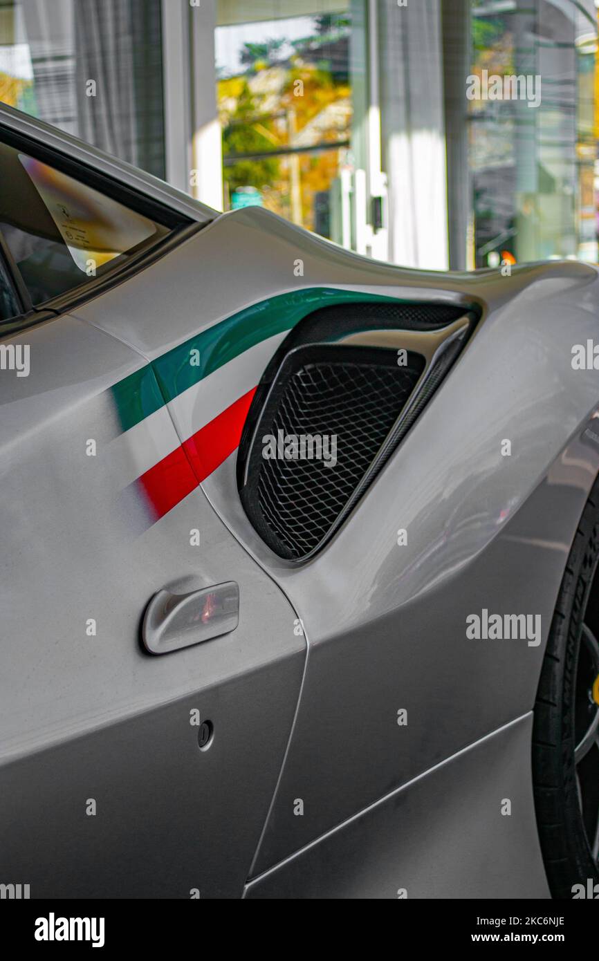 A vertical shot of a Ferrari 488 Pista with the Italian flag Stock ...