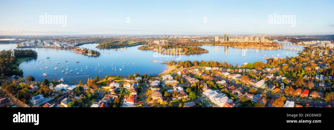 Western Sydney in wide aerial panoram along Parramatta river from Inner ...