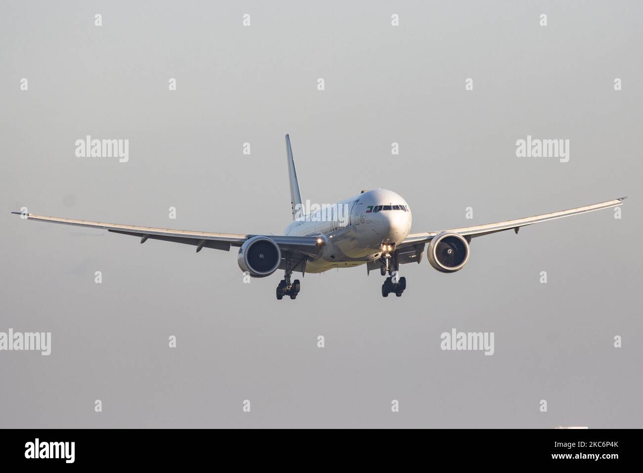 Kuwait Airways Boeing 777-300 aircraft as seen on final approach flying ...
