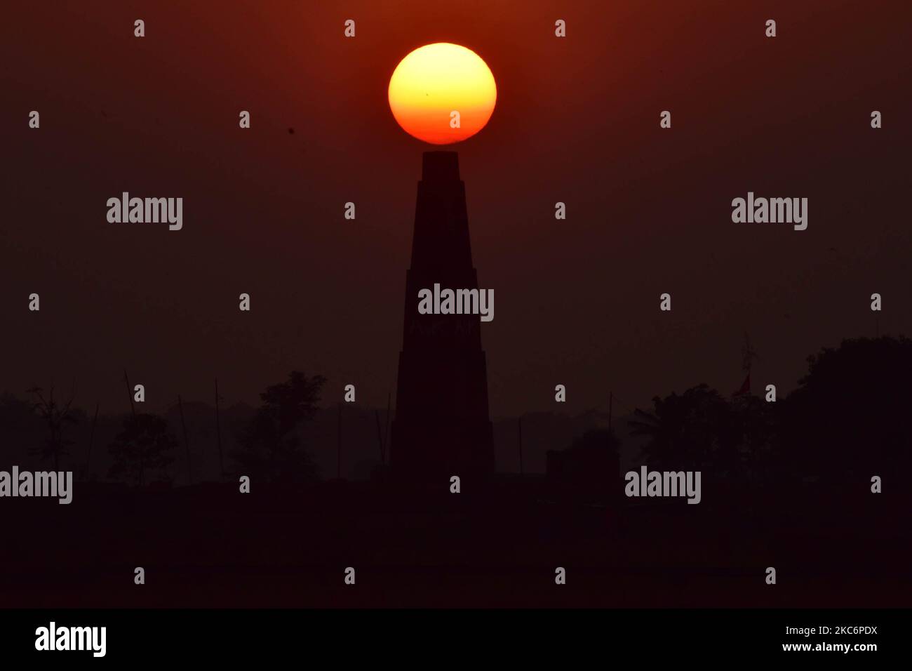 The sunset behind the brick kiln factory in Nagaon District of Assam ...