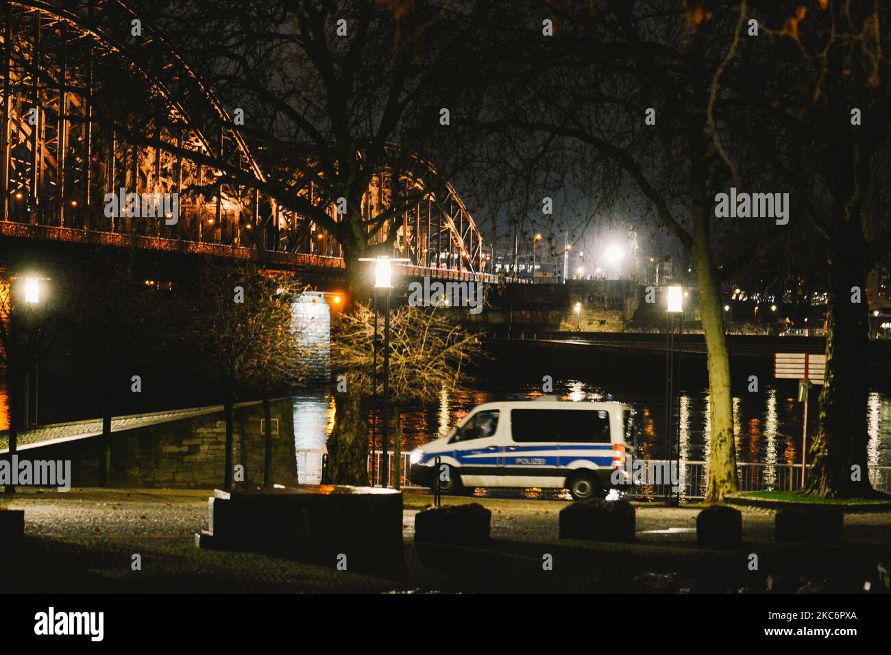 Police car is seen patrolling the Rhine river which leads to the Dom ...
