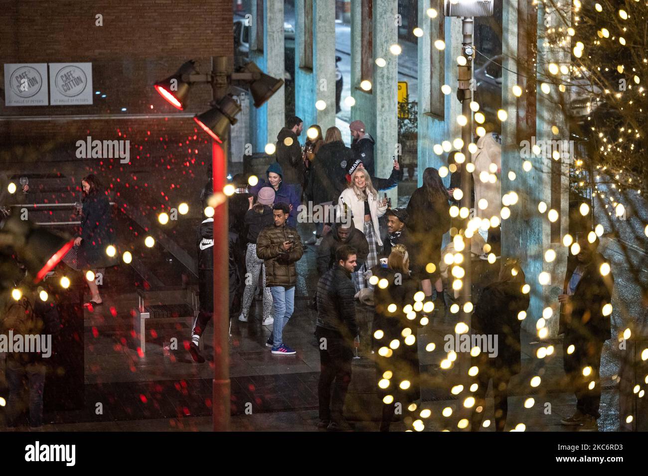 Revellers celebrate New Year outside in the sleet in Cutting Room ...