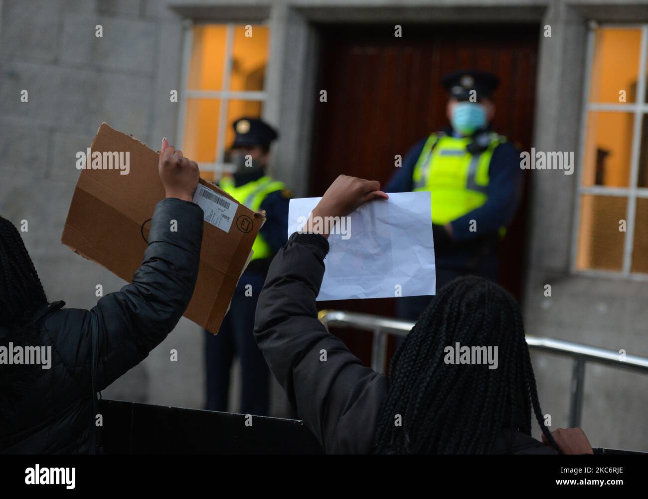People seen during a candlelit vigil and protest for George Nkencho ...