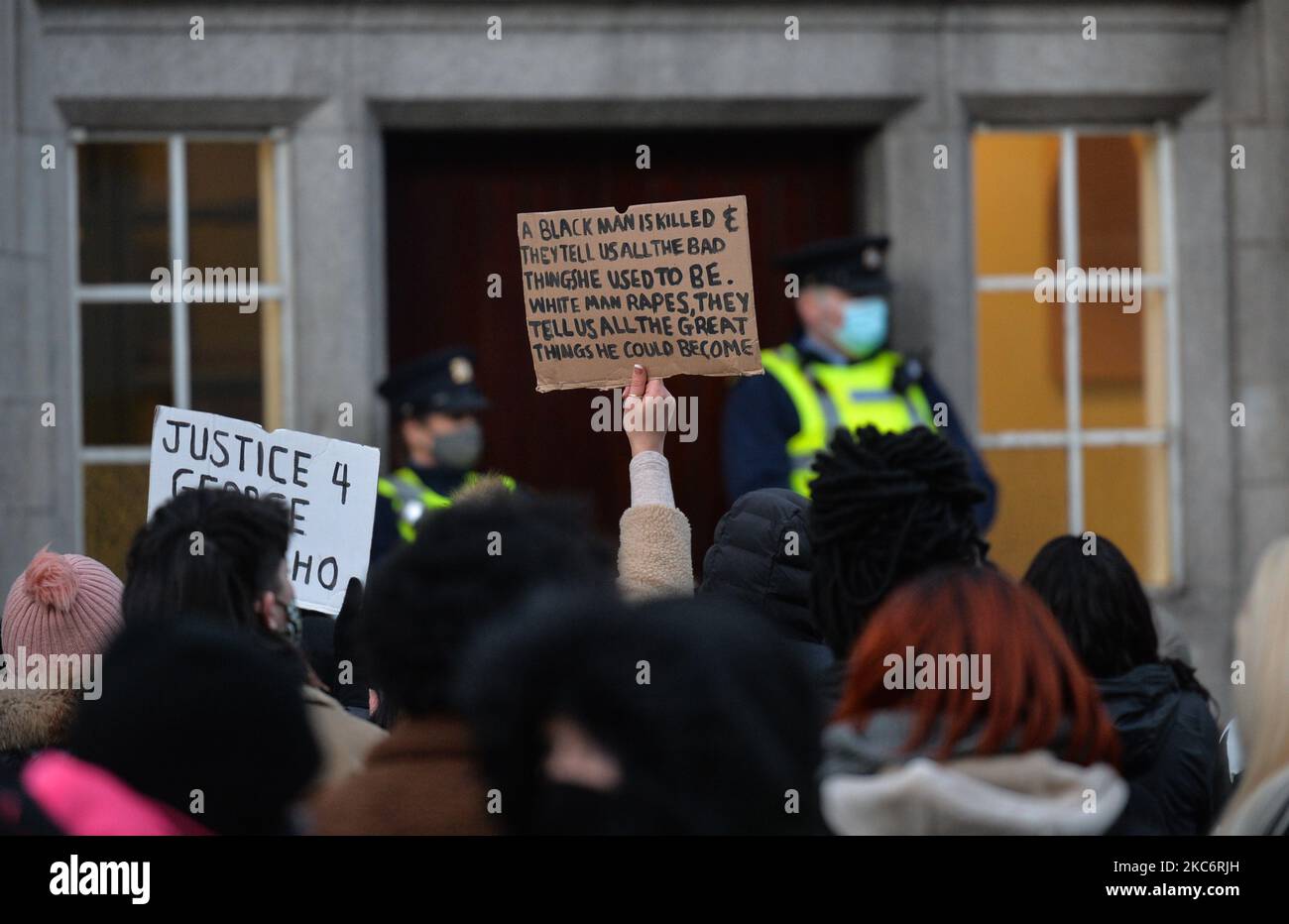 People seen during a candlelit vigil and protest for George Nkencho ...