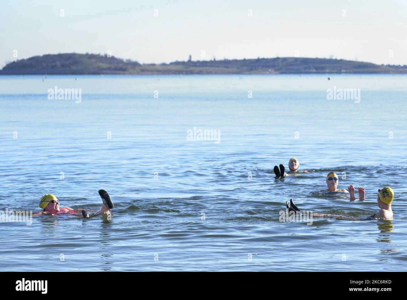 Members of the L-Street Brownies celebrate the new year with an ocean ...