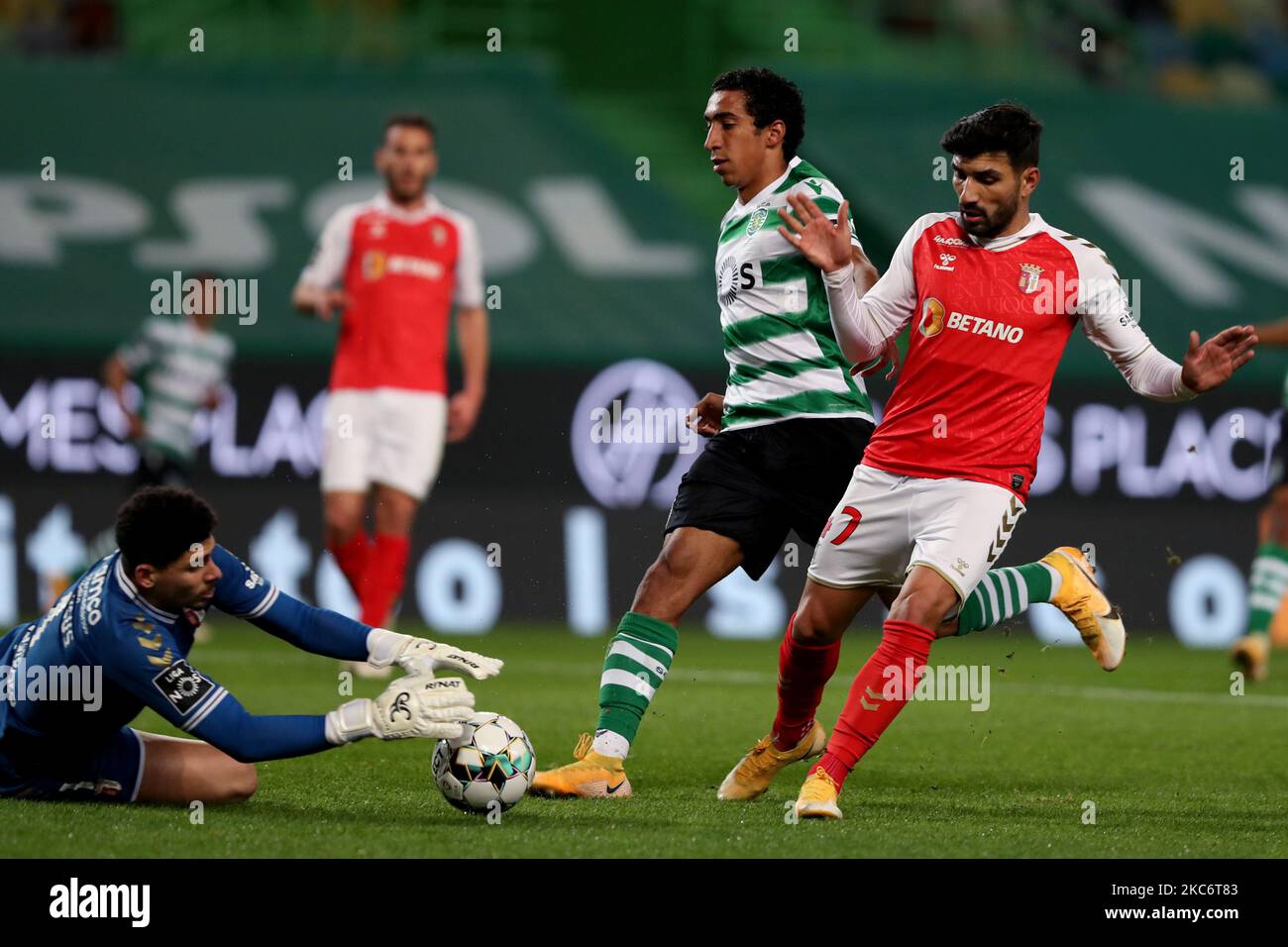 SC Braga's goalkeeper Matheus Magalhaes (L) vies with Tiago Tomas of ...