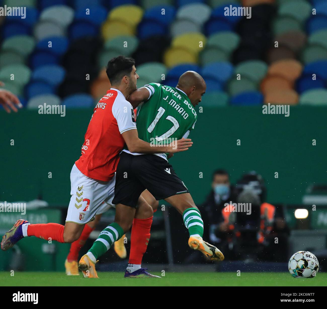 Joao Mario of Sporting CP and Joao Novais of SC Braga in action during ...