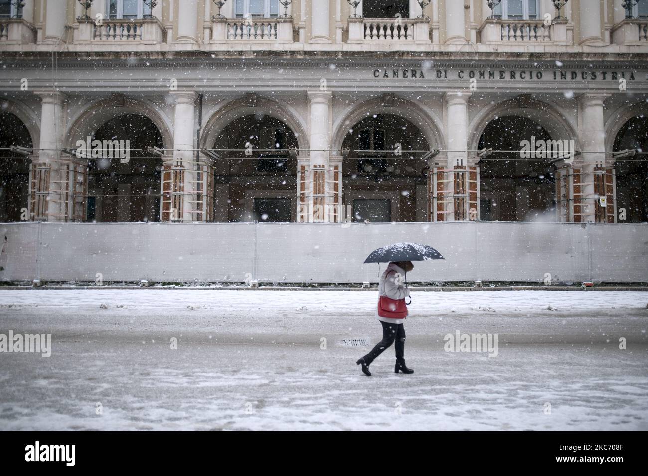 In the city of L'Aquila on 5 January, 2021, Italy, Abruzzo, snow falls ...