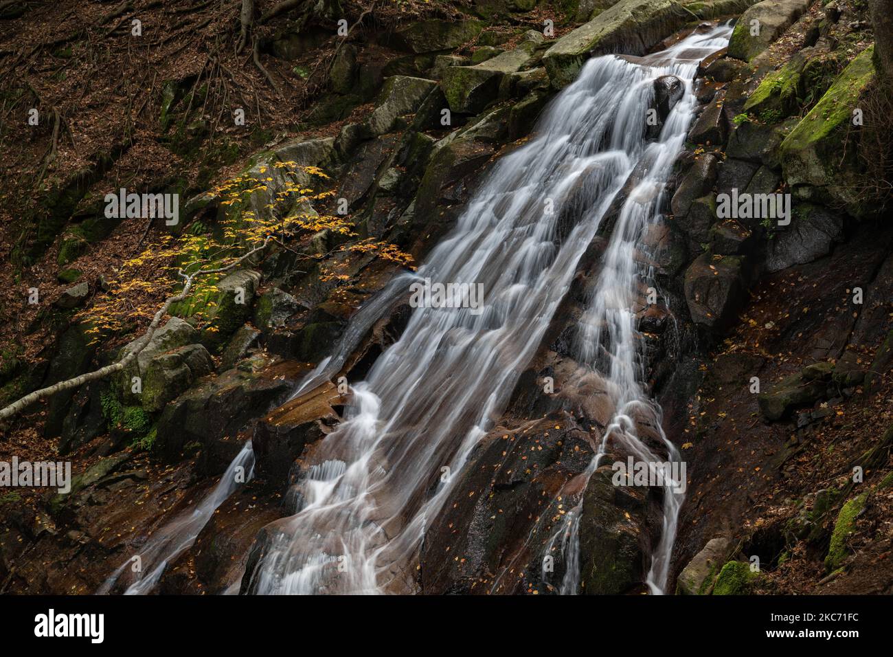 water streaming down the cascades in autumn Stock Photo - Alamy