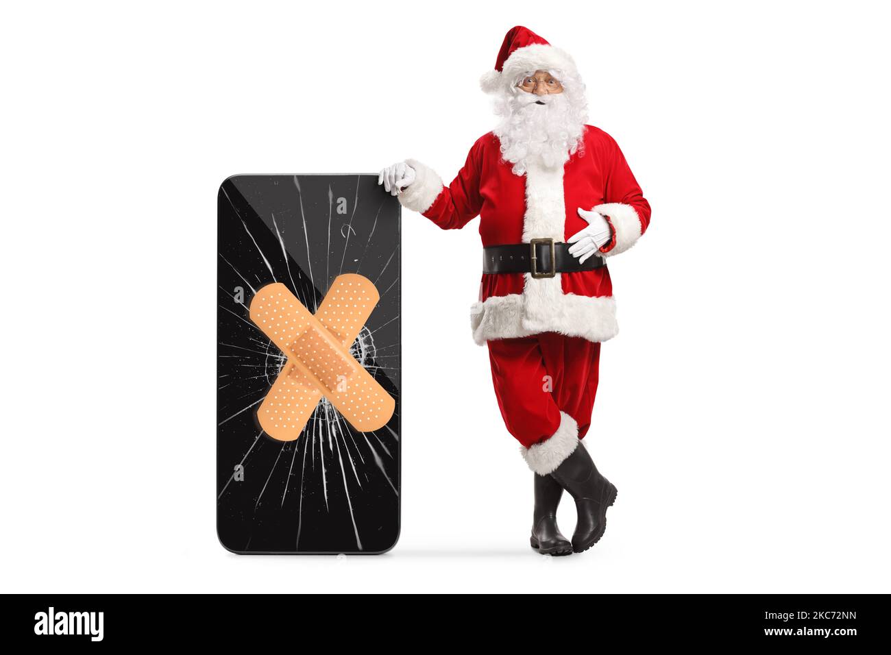 Santa claus leaning on a smartphone with a broken screen fixed with ...