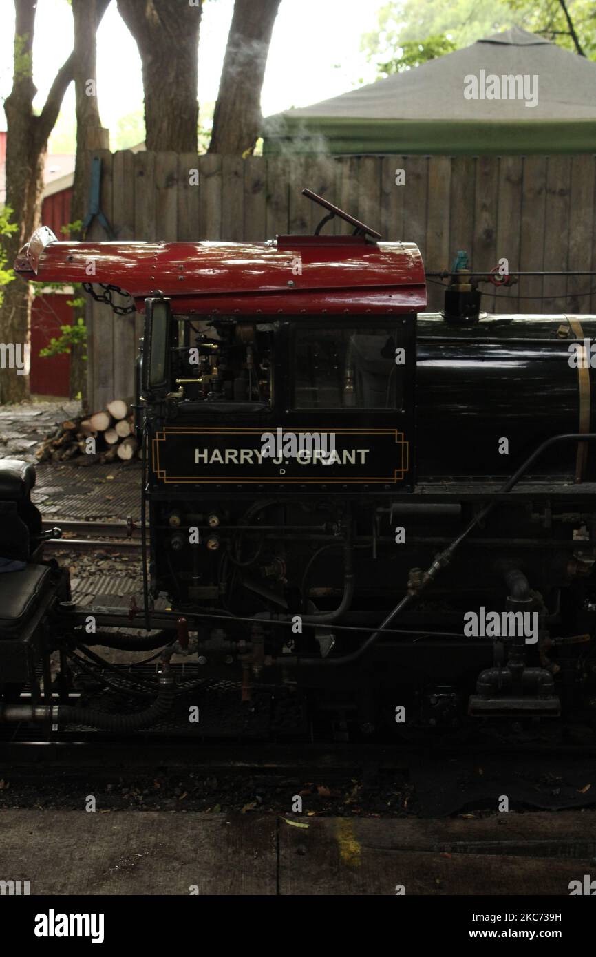The back end of black and red steam engine in Milwaukee zoo Stock Photo ...