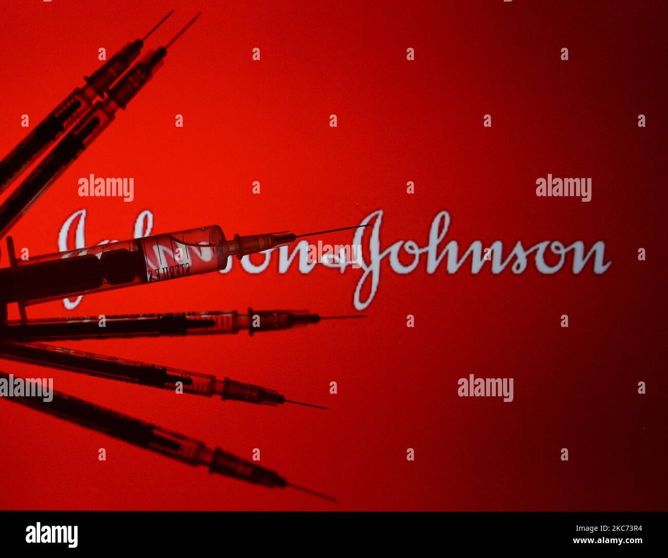 An illustrative image of medical syringes in front of Johnson and ...