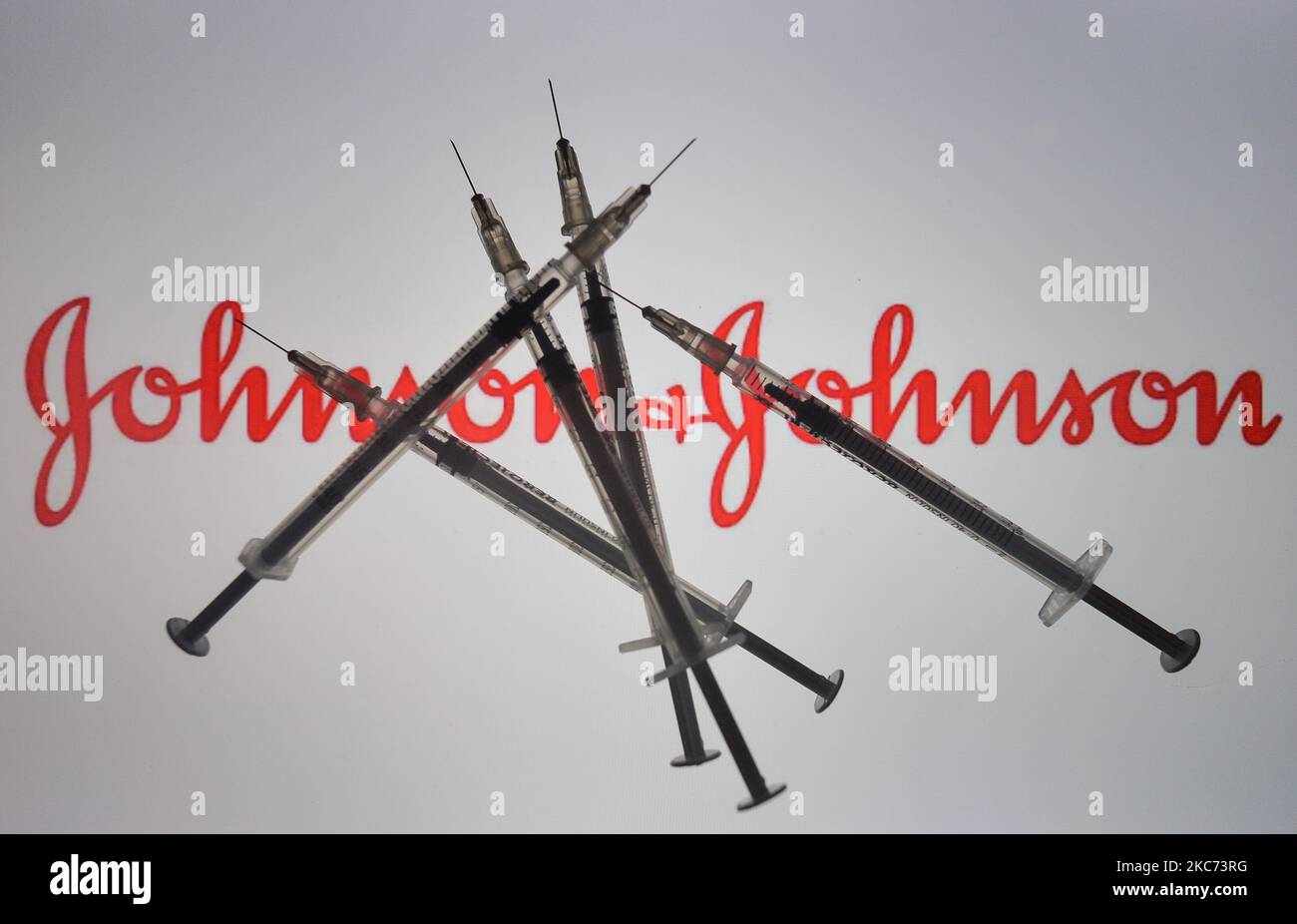 An illustrative image of medical syringes in front of Johnson and ...