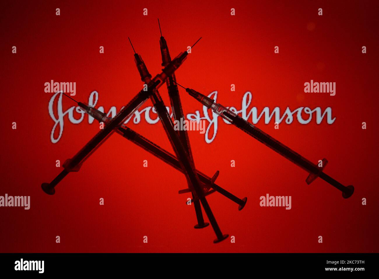 An illustrative image of medical syringes in front of Johnson and ...