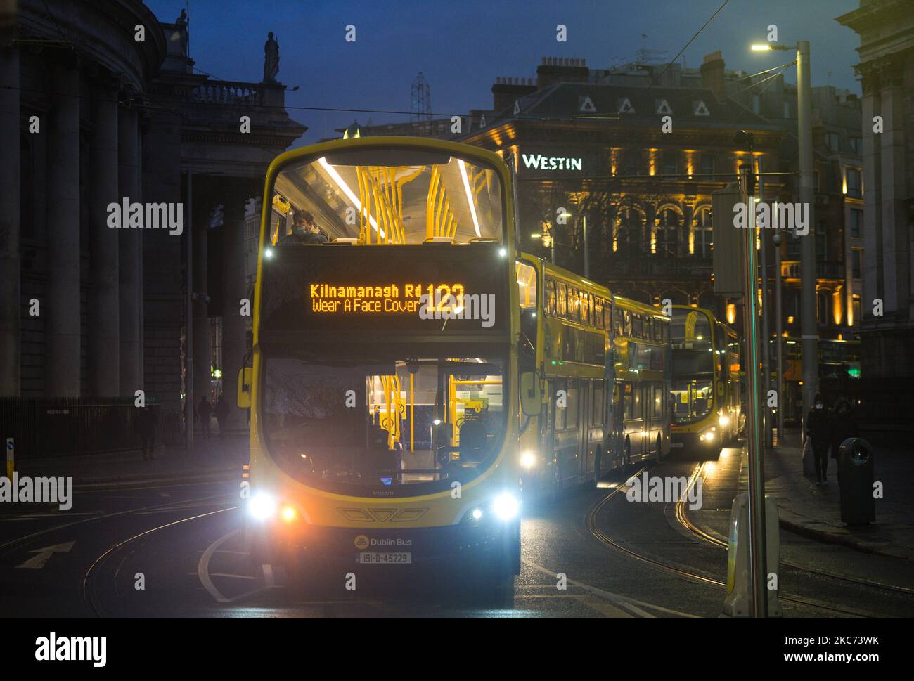 A line of public buses seen in empty Dublin city center. On Thursday ...