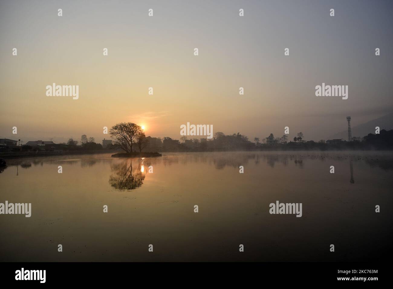 View of Taudaha Wetland Lake in a misty morning over at Kirtipur ...
