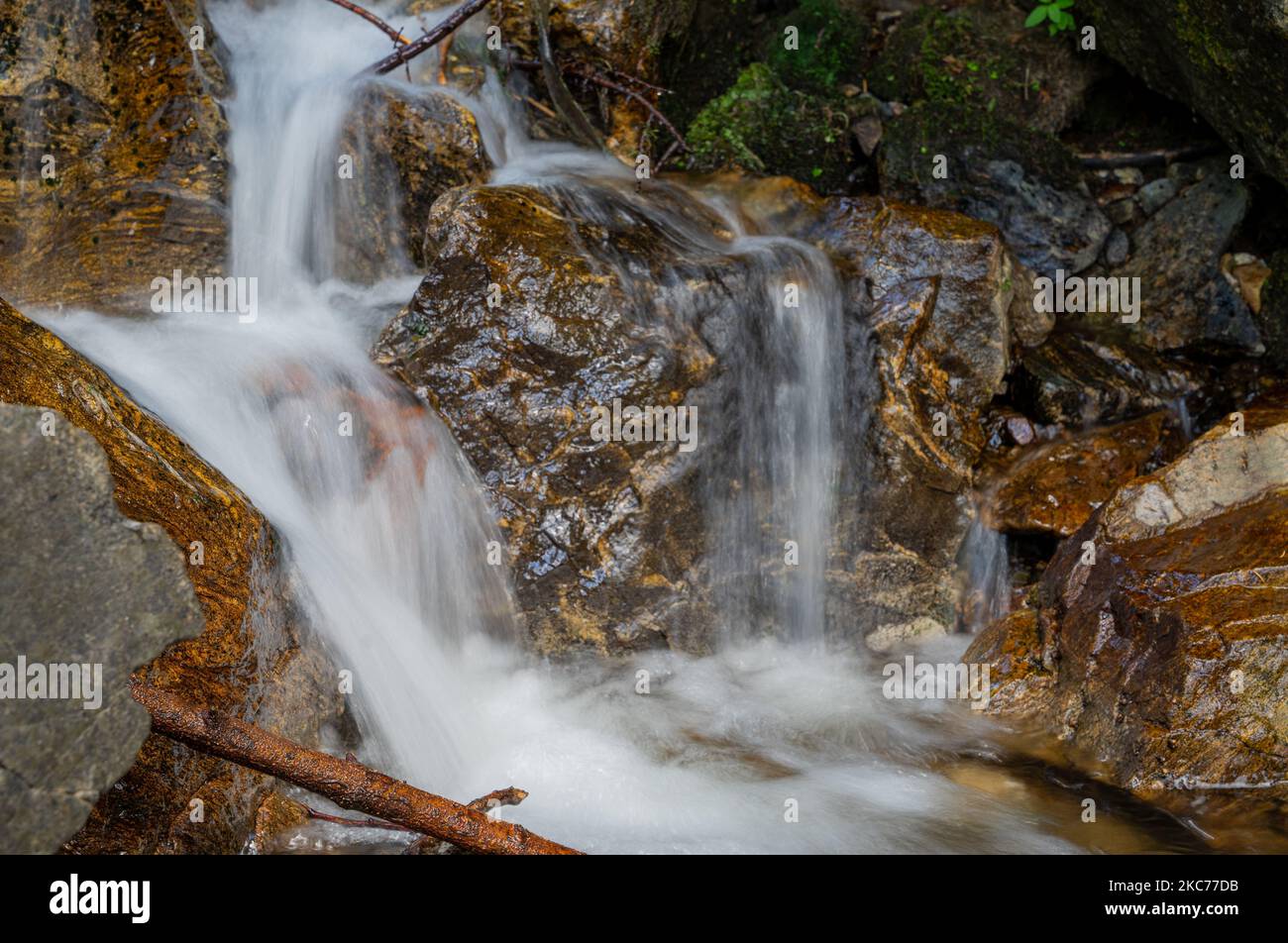 A scenic view of Todtnau Waterfall flowing through rocks in Germany ...