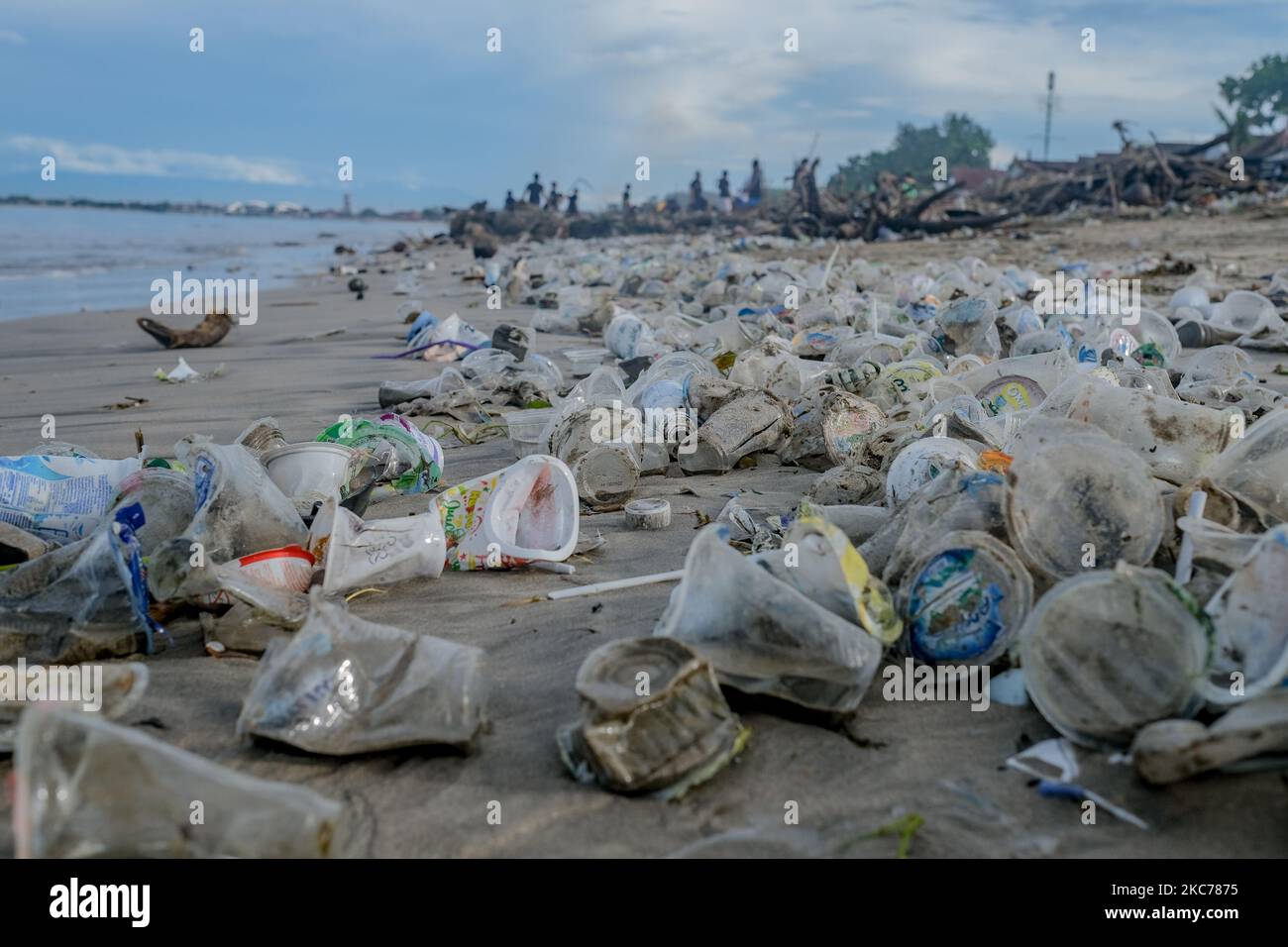 Hundreds of Jimbaran villagers worked together to clean up tens of tons ...