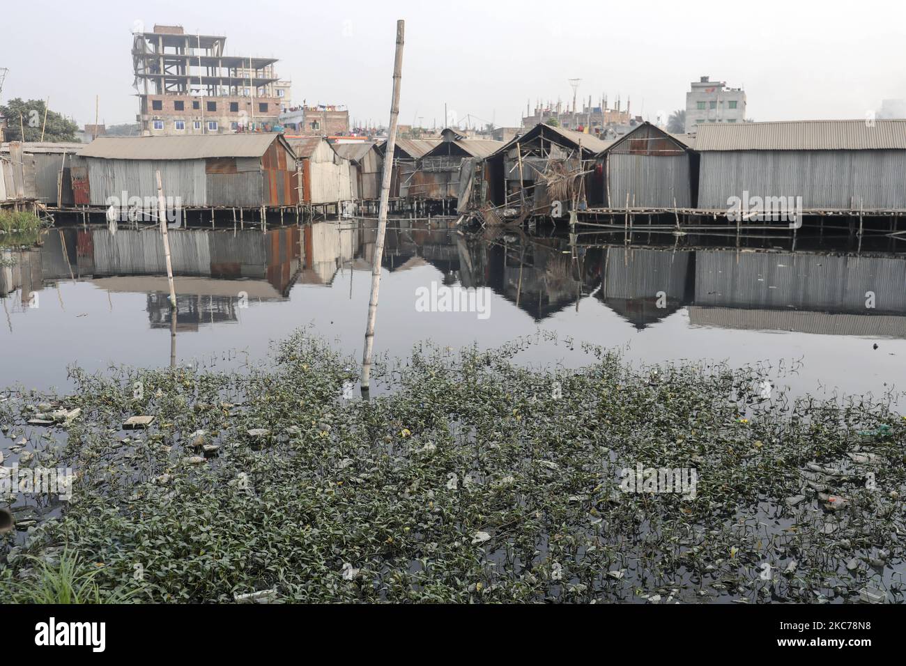 A view of a slum area beside a railway in Dhaka, Bangladesh on Sunday ...