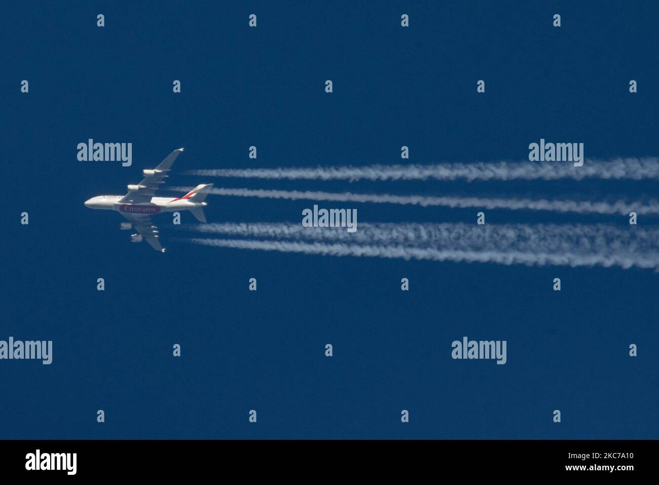 Emirates Airbus A380 aircraft as seen flying in the blue sky over the ...