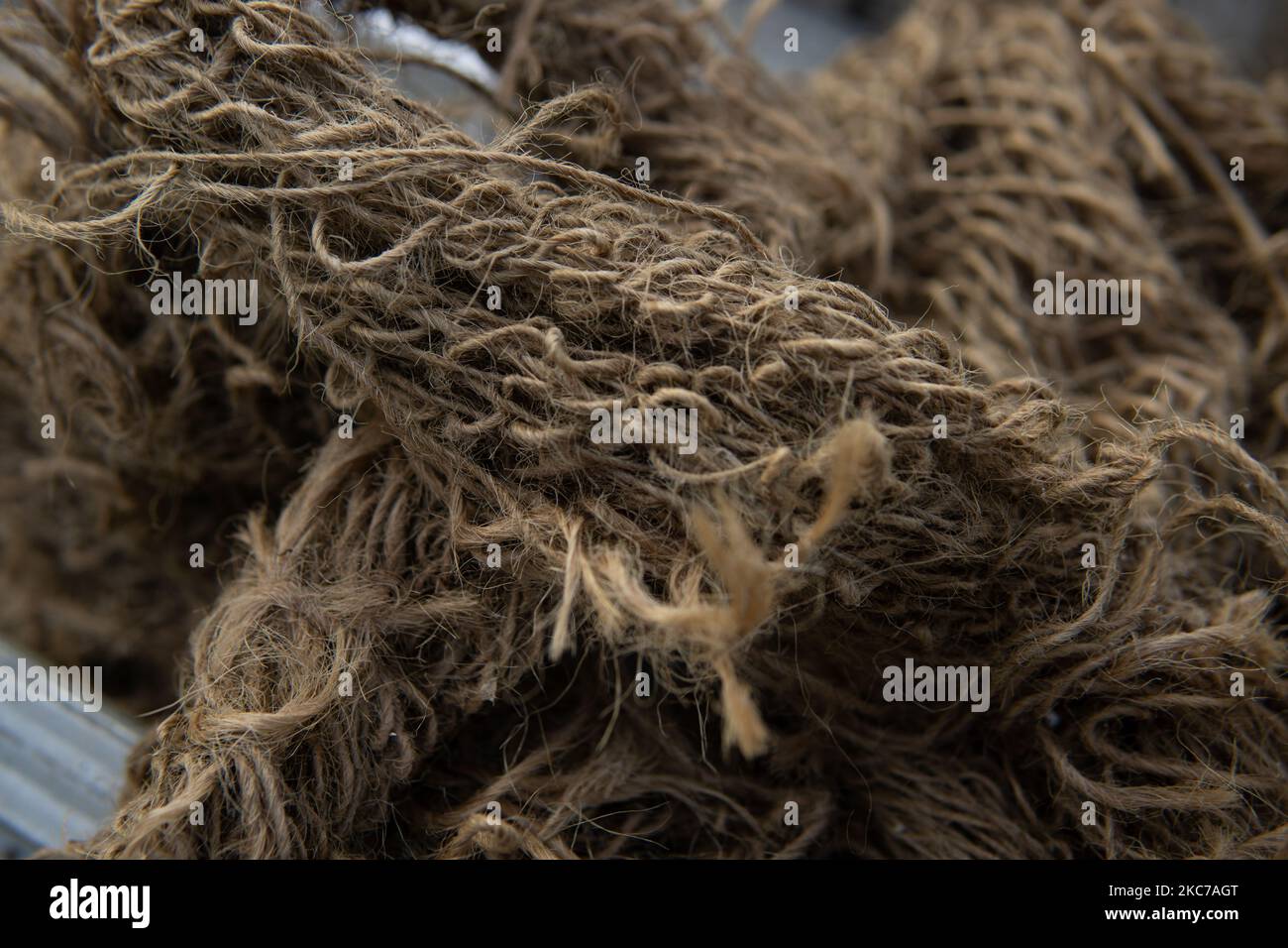 A close-up of tangled gunny sack bags and thin ropes Stock Photo - Alamy