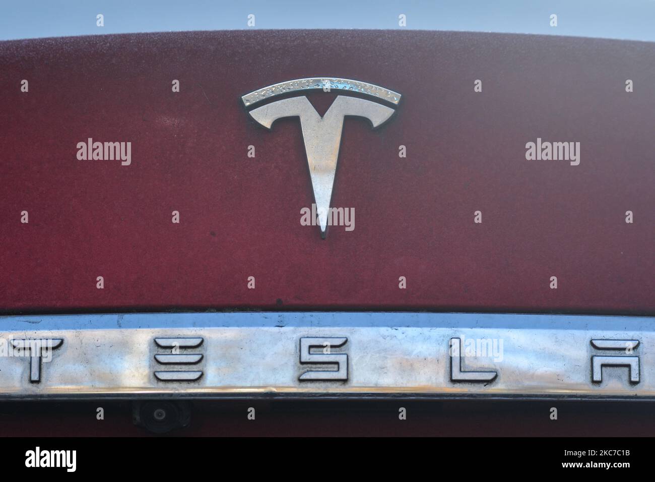 A Tesla logo seen on a parked car in Dublin city center. On Tuesday ...