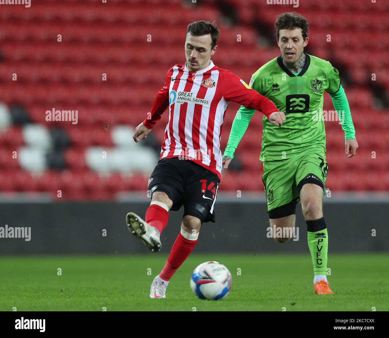 Josh Scowen of Sunderland in action with Danny Whitehead of Port Vale ...