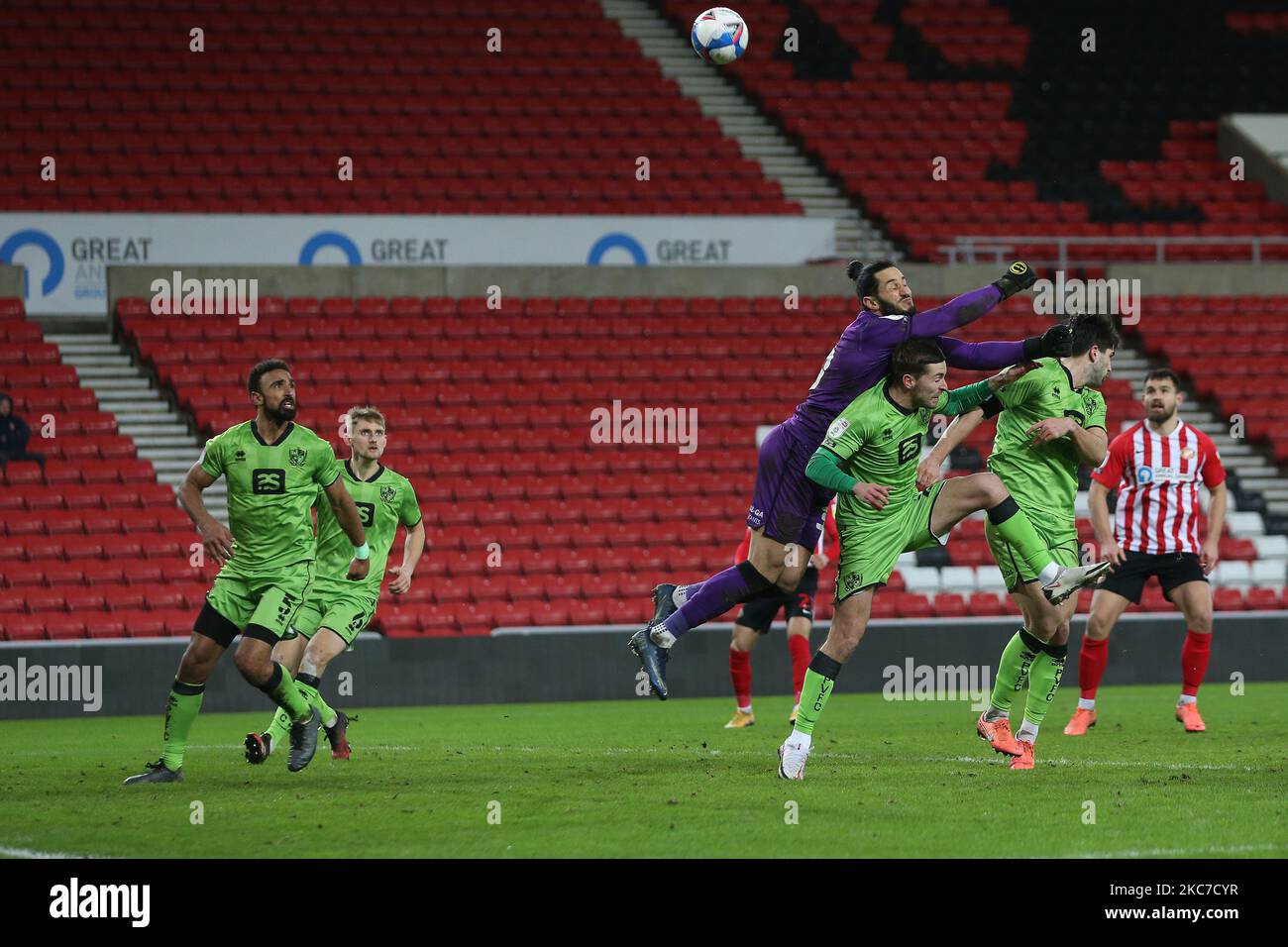 Dino Visser of Port Vale tries to punch a cross clear during the EFL ...