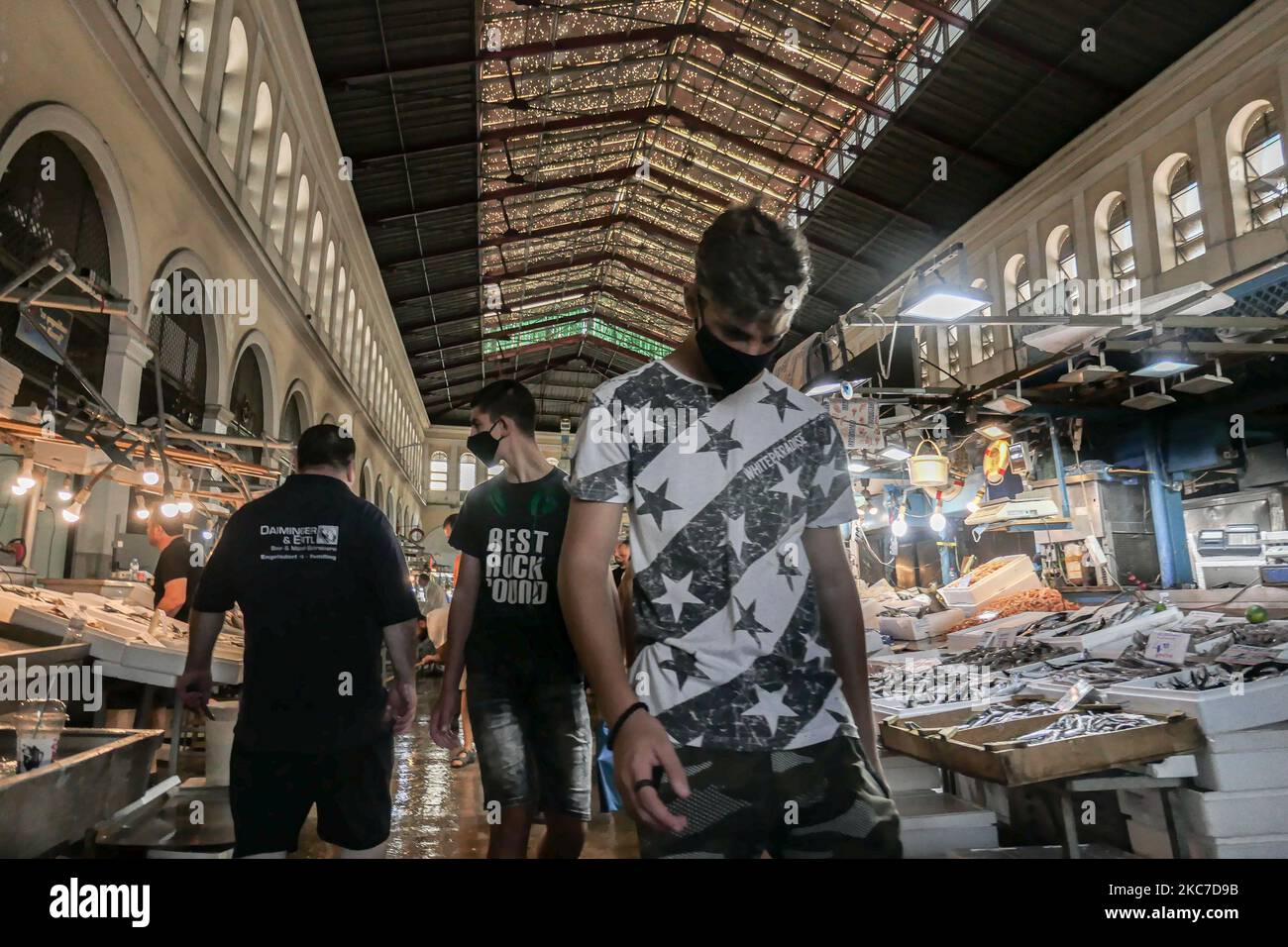 Daily life scene in the Varvakios central fish market in downtown ...