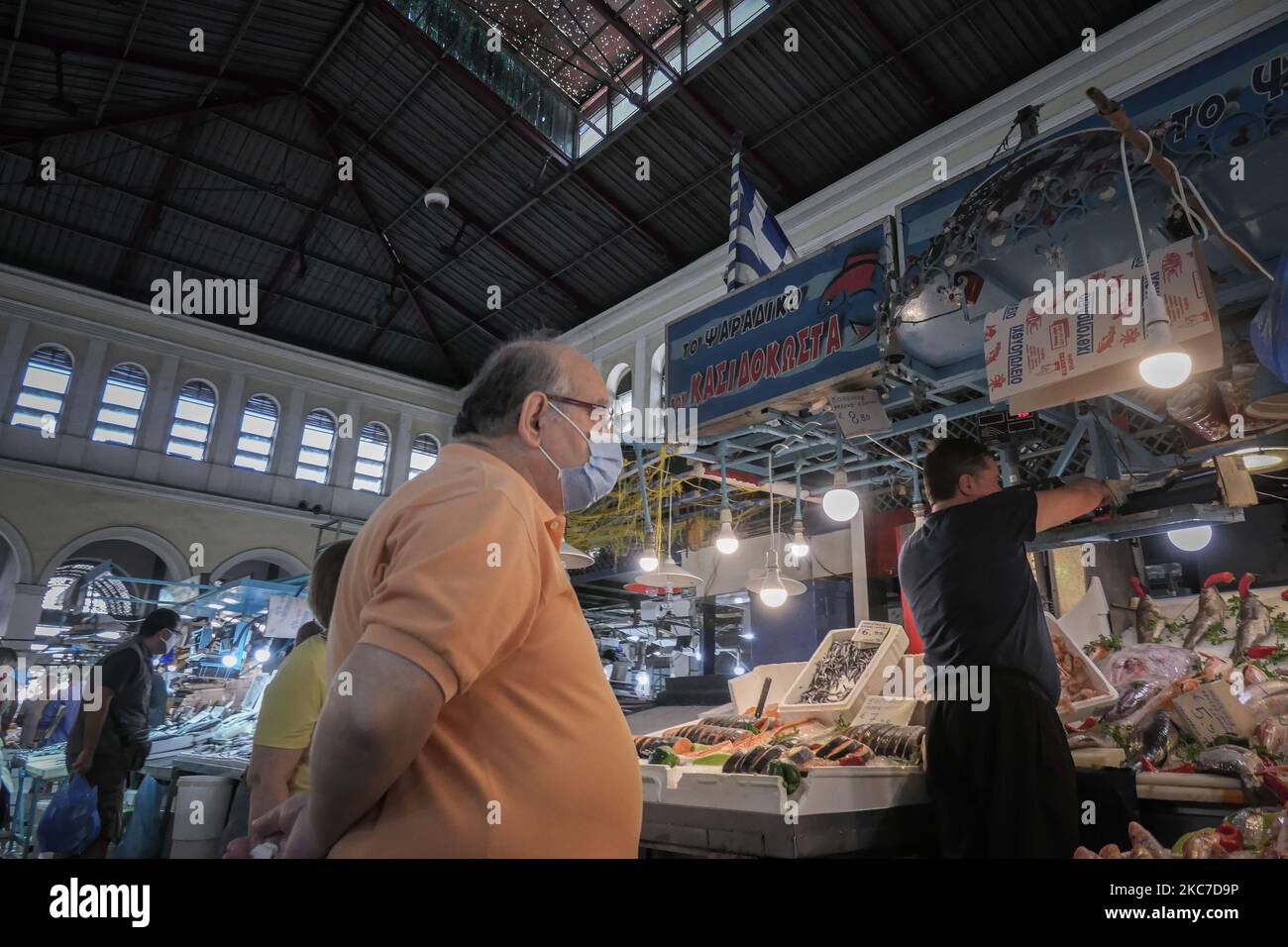 Daily life scene in the Varvakios central fish market in downtown ...