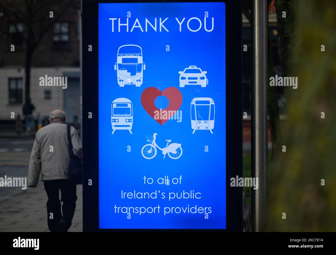 A street billboard 'Thank You, to all of Ireland's public transport ...