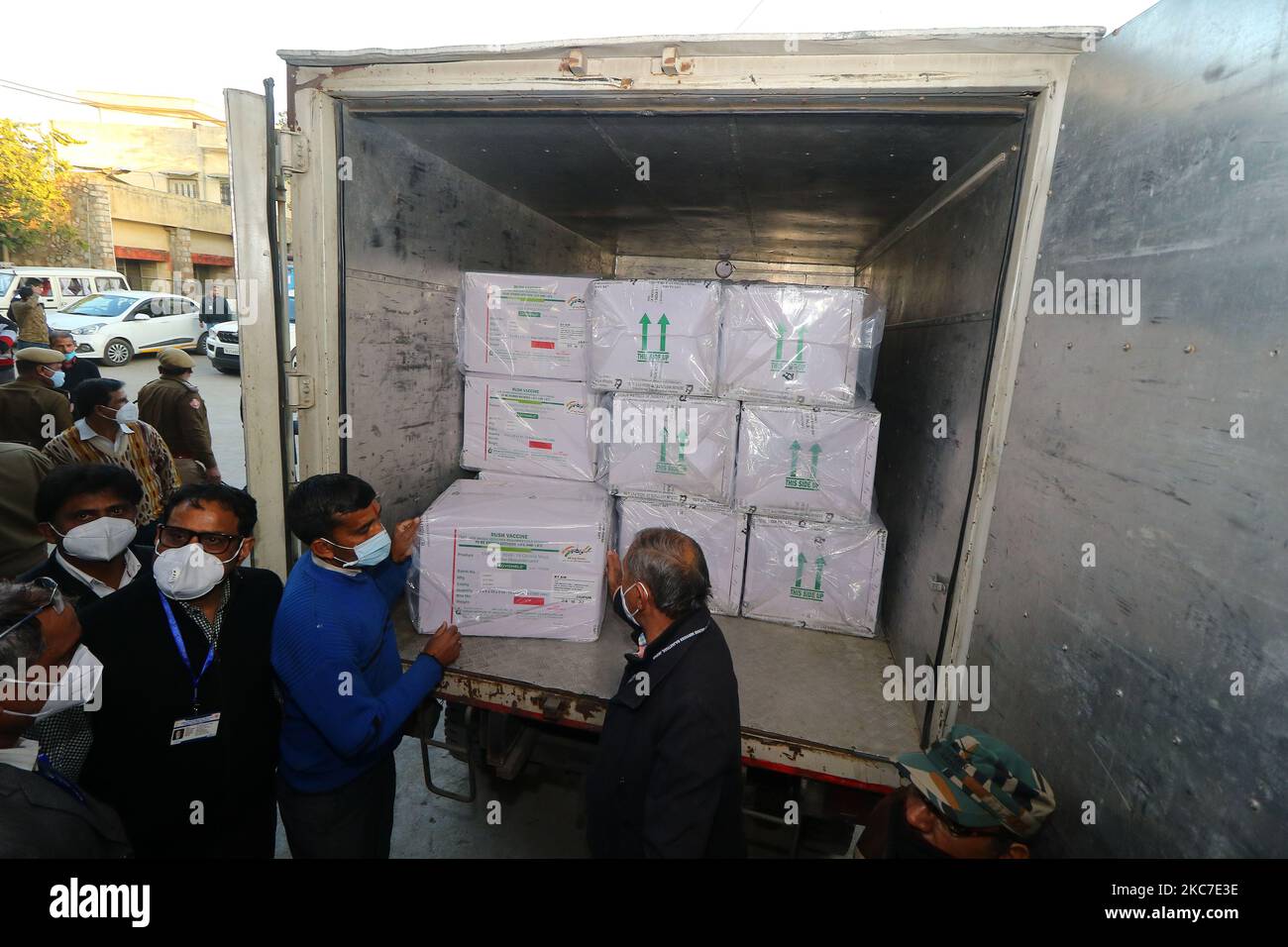 Workers unload the Second consignment of COVID-19 vaccination Serum ...
