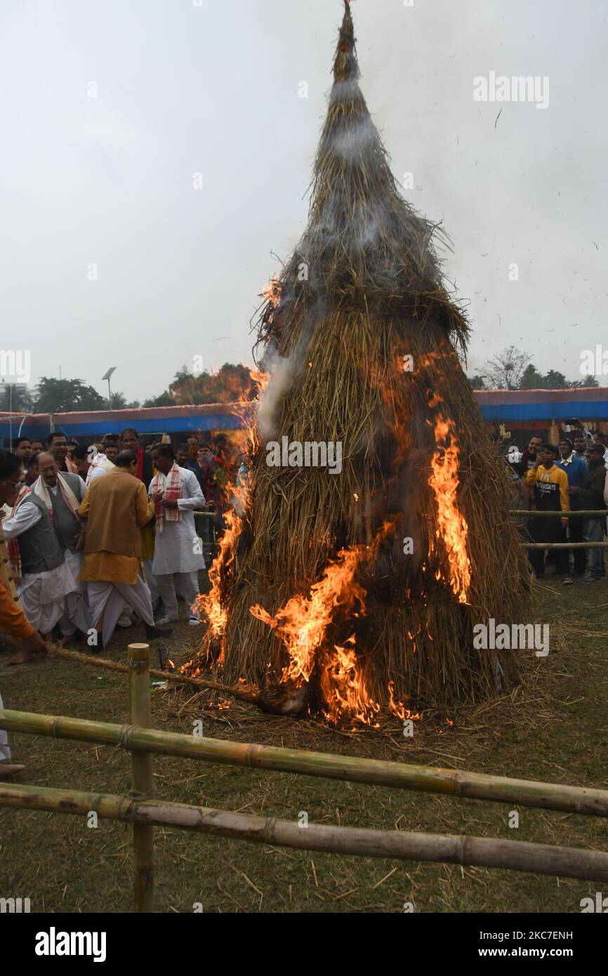 Traditional Assamese 'Meji', a house made of straw, being burnt during ...